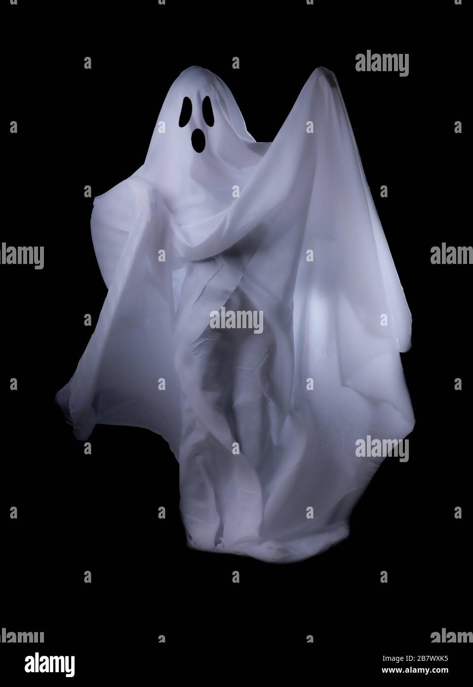 Scary white ghost at big eye on a black background for Halloween ...