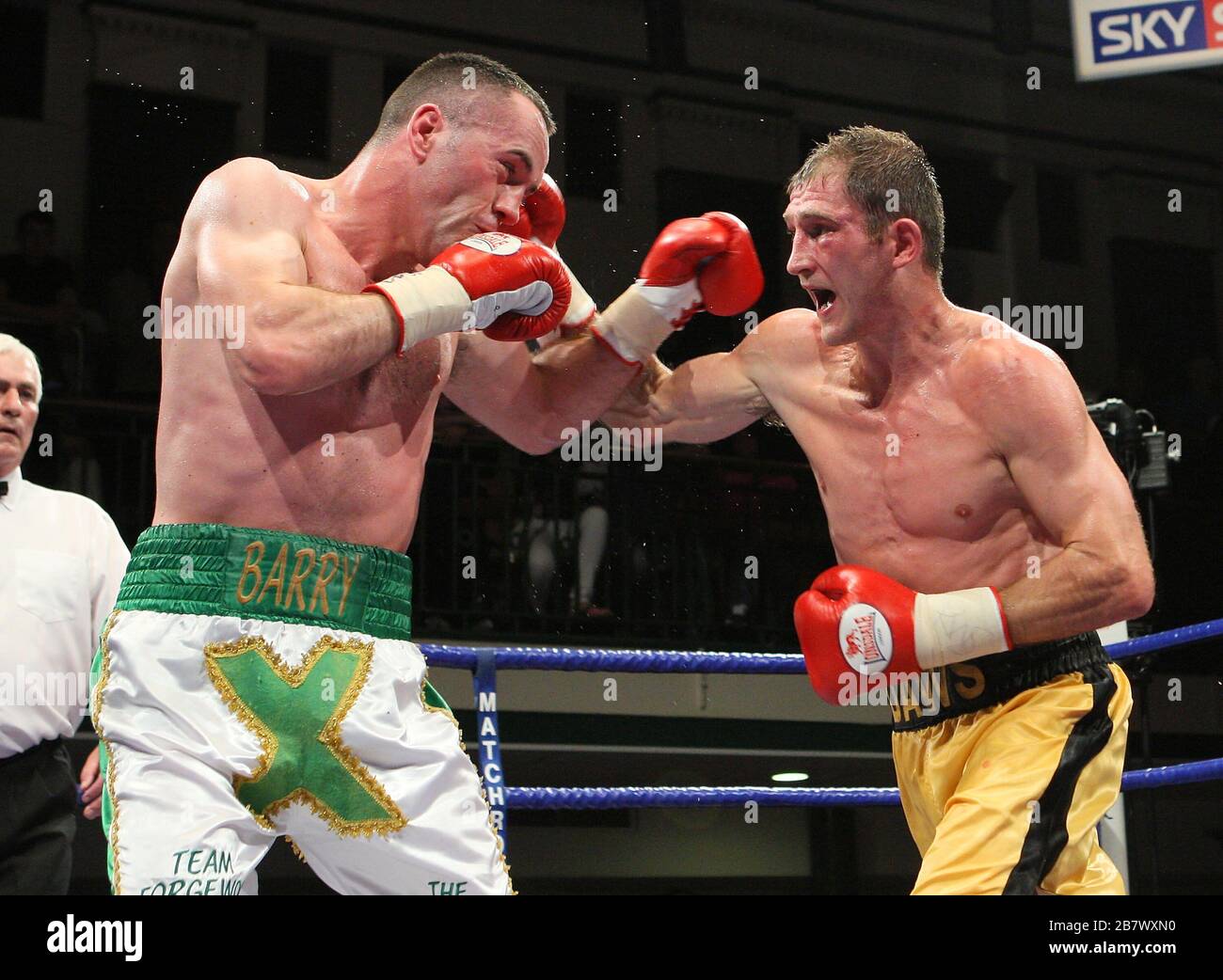 Lenny Daws (yellow shorts) defeats Barry Morrison in a ...
