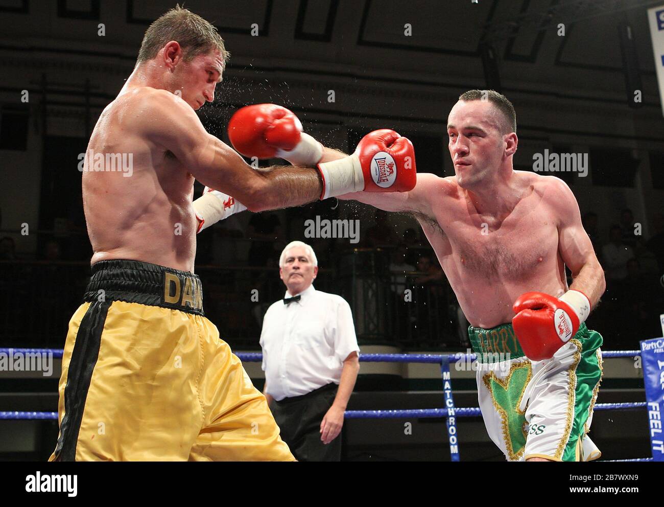 Lenny Daws (yellow shorts) defeats Barry Morrison in a ...