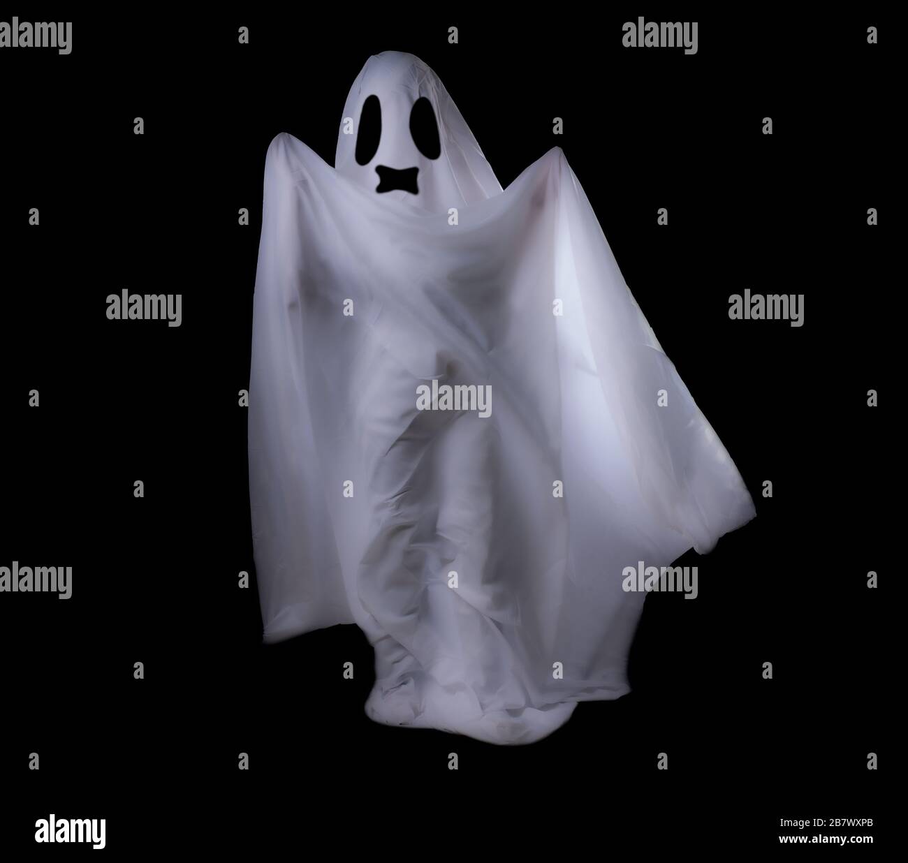 Scary white ghost at big eye on a black background for Halloween ...