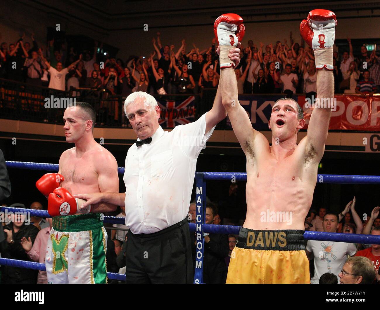 Lenny Daws (yellow shorts) defeats Barry Morrison in a ...