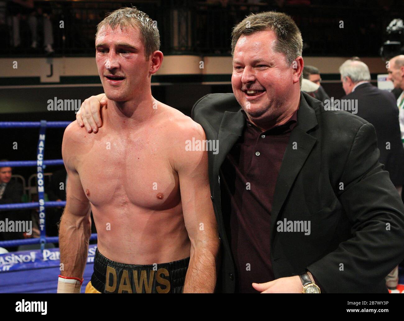 Lenny Daws is congratulated by promoter Mick Hennessy Lenny Daws ...