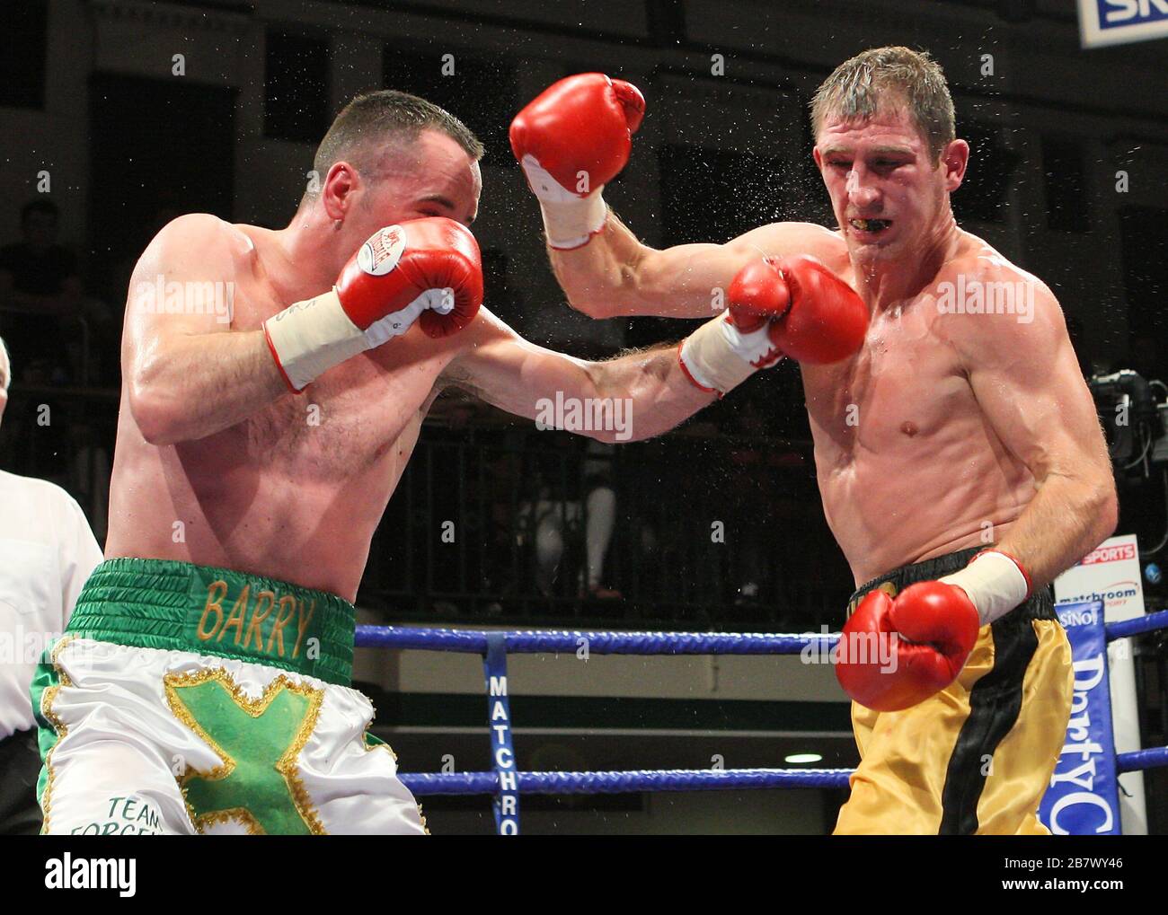 Lenny Daws (yellow shorts) defeats Barry Morrison in a ...