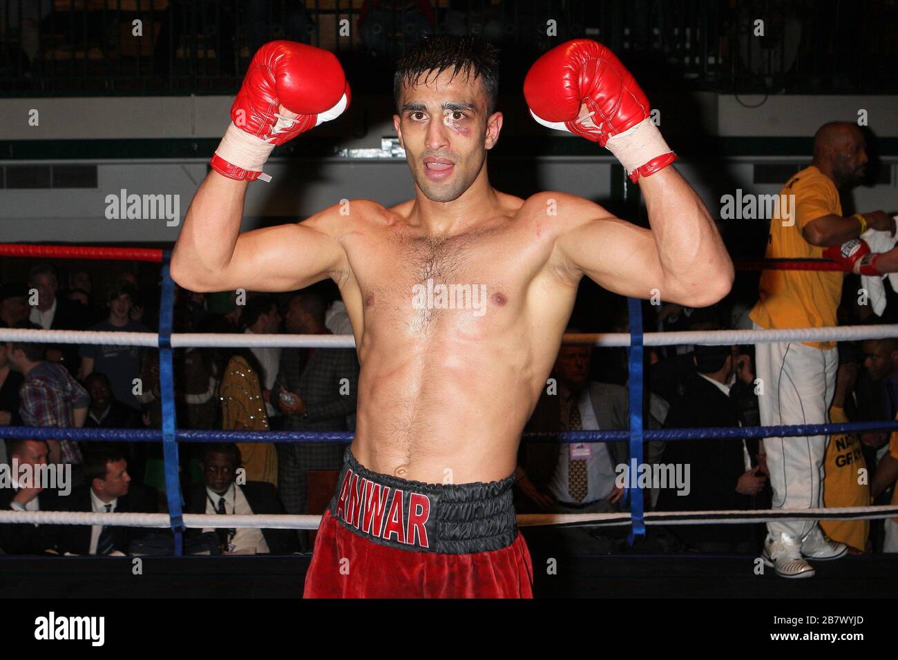 Adil Anwar (red/black shorts) defeats Nathan Graham in a Welterweight ...