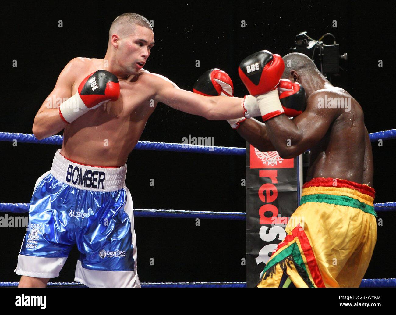 Tony Bellew (Liverpool, blue shorts) defeats Ayittey Powers (St Pancras ...