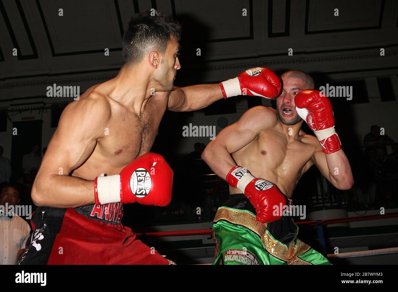 Adil Anwar (red/black shorts) defeats Nathan Graham in a Welterweight ...