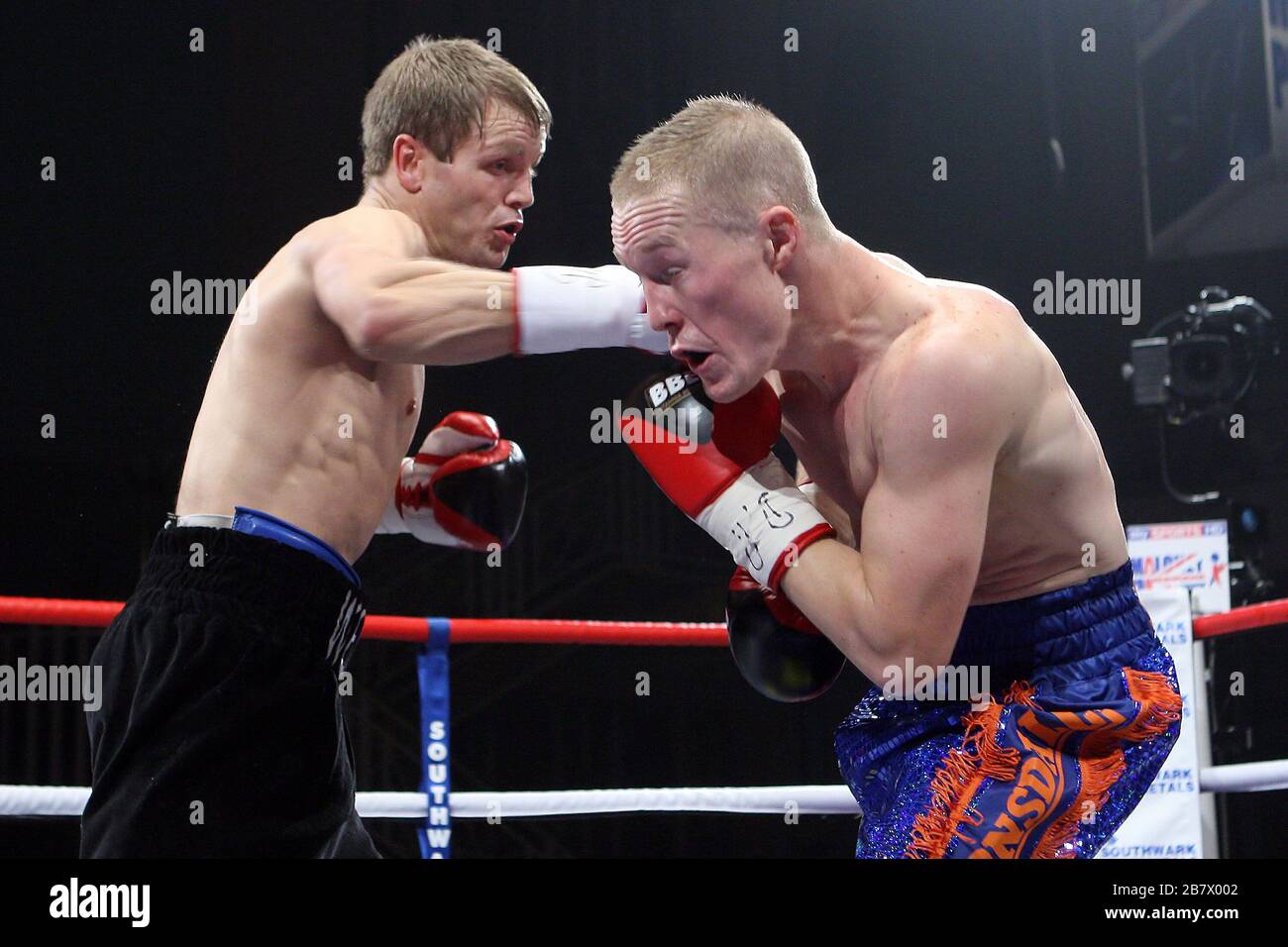 Sam Webb (black shorts) defeats Martin Concepcion in LightMiddleweight ...