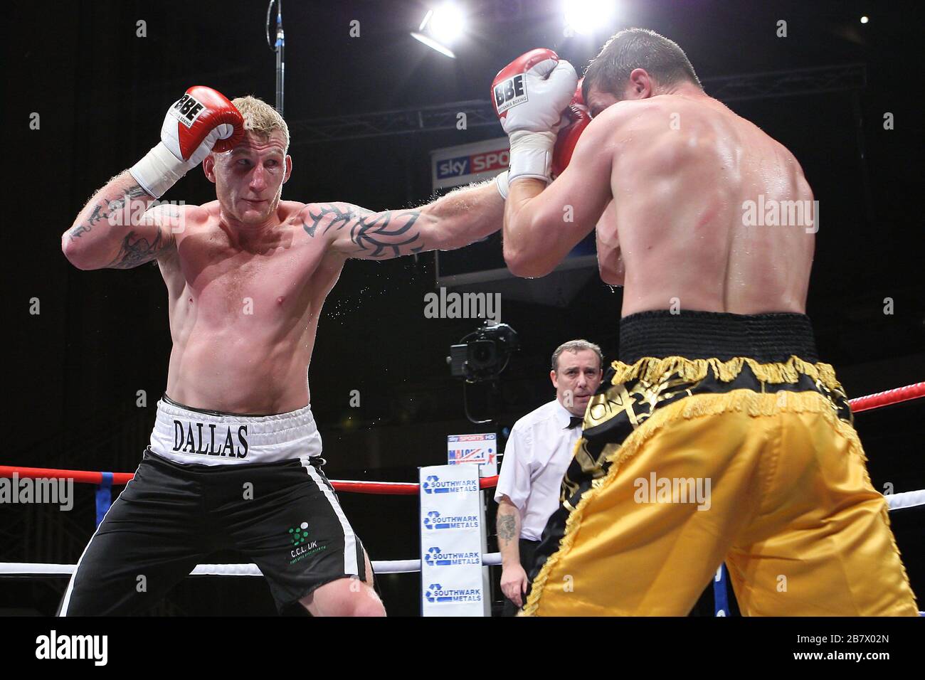 Tom Dallas (black shorts) defeats Paul Morris in a Heavyweight boxing ...