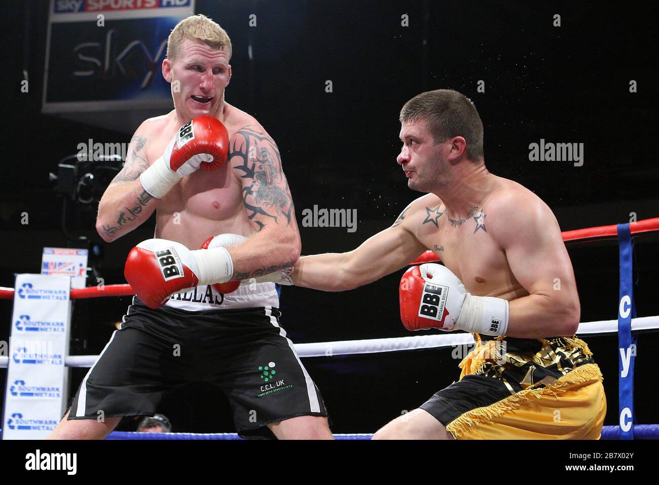 Tom Dallas (black shorts) defeats Paul Morris in a Heavyweight boxing ...