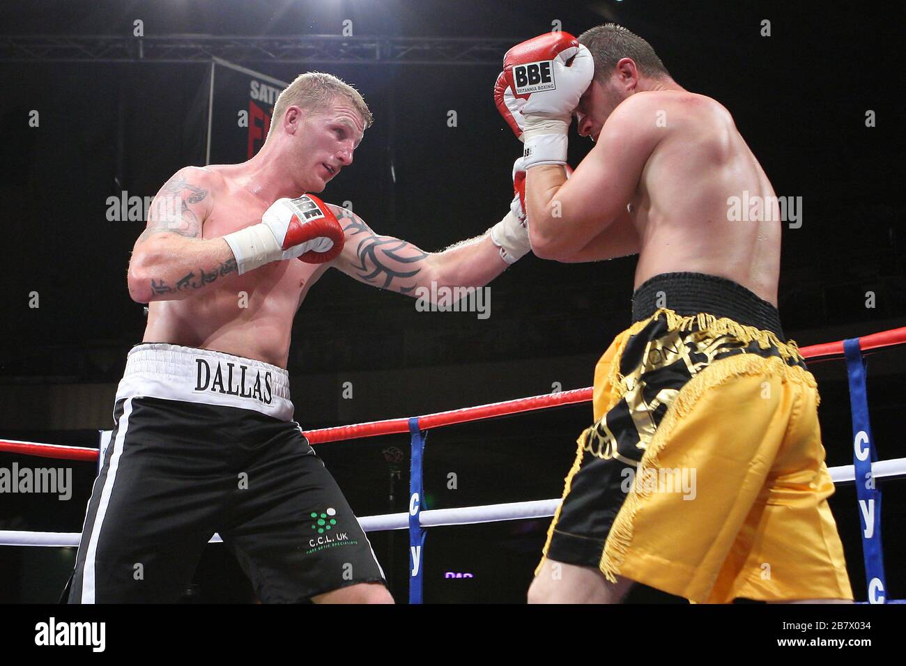 Tom Dallas (black shorts) defeats Paul Morris in a Heavyweight boxing ...