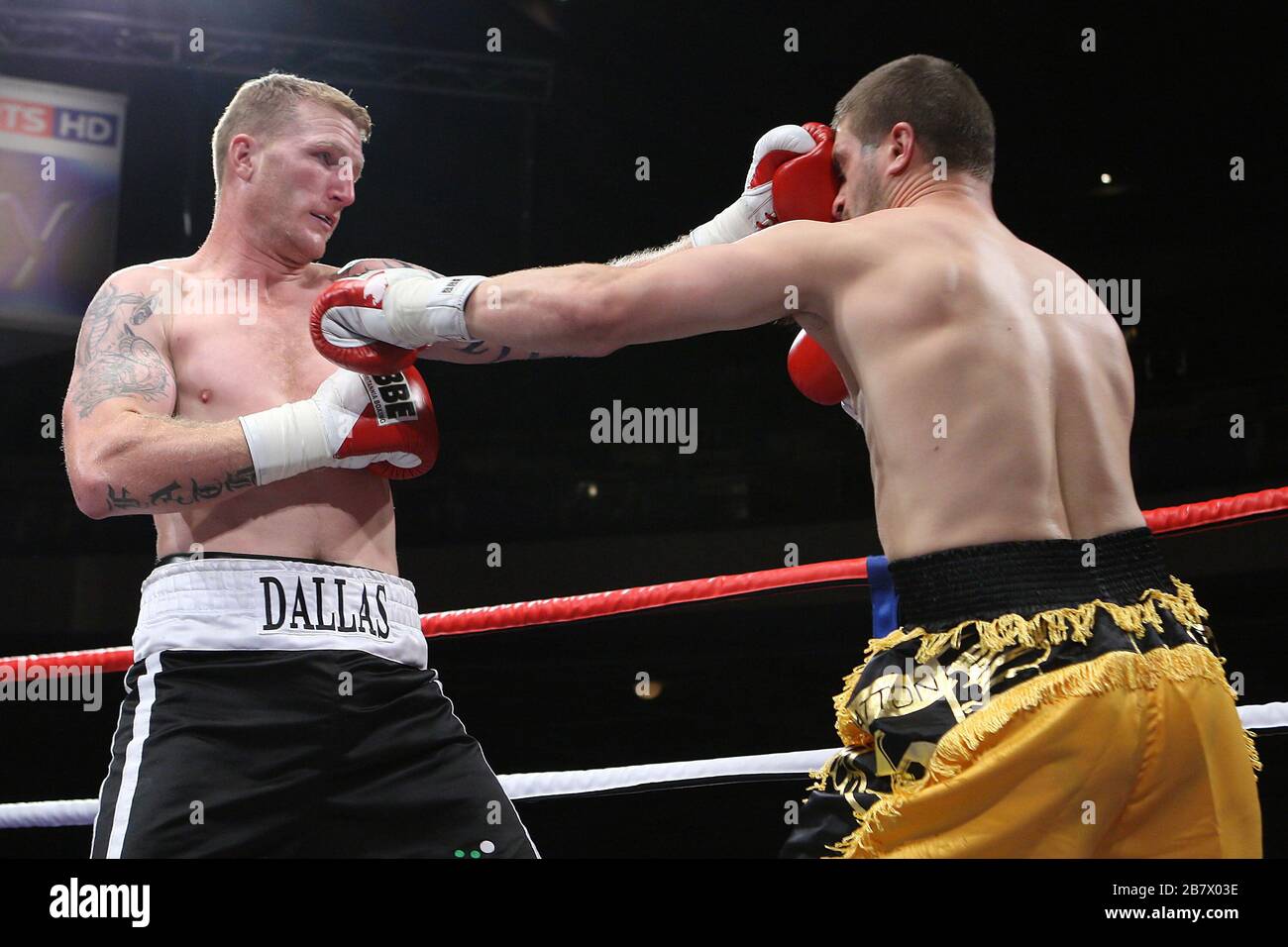 Tom Dallas (black shorts) defeats Paul Morris in a Heavyweight boxing ...