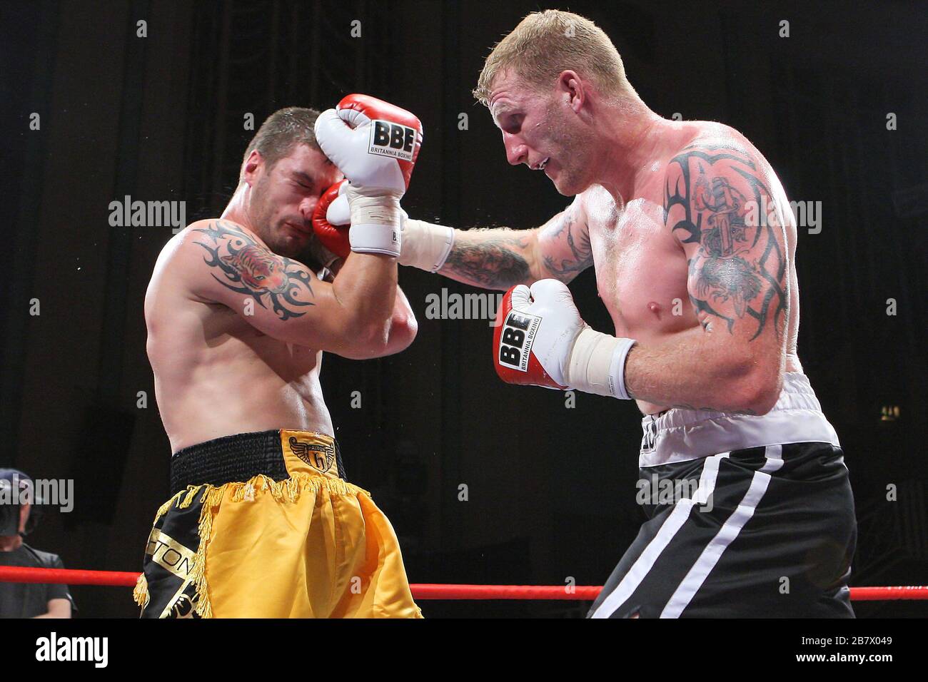 Tom Dallas (black shorts) defeats Paul Morris in a Heavyweight boxing ...