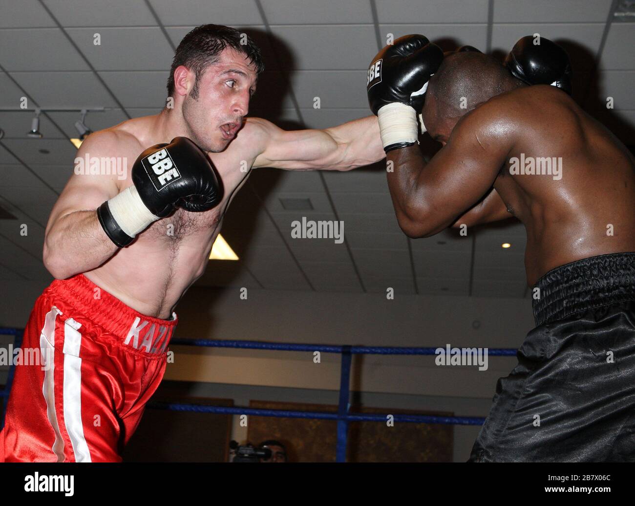 Ghokan Kazaz (Walthamstow, red shorts) defeats Sherman Alleyne in a ...