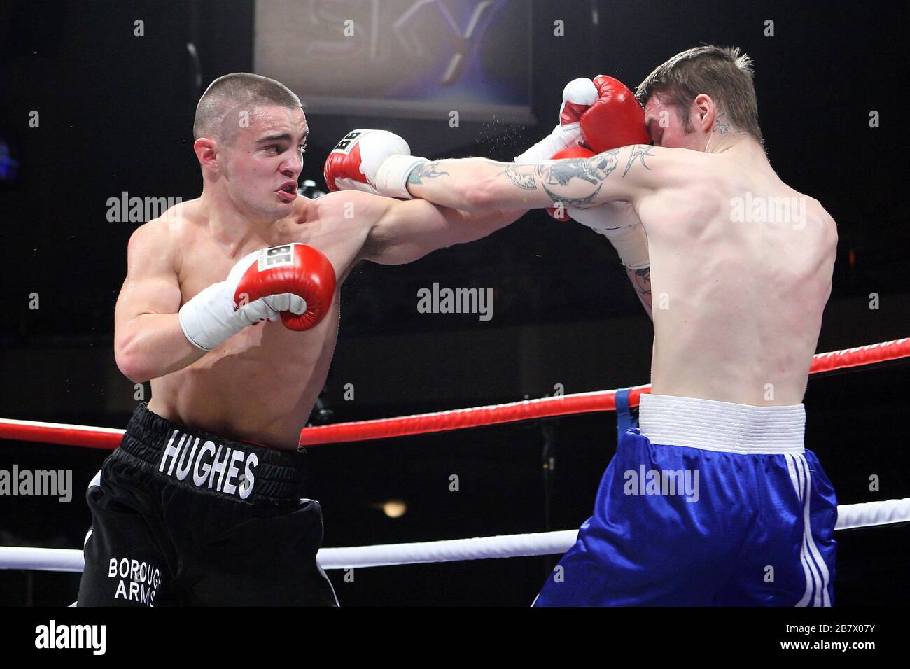Joe Hughes (black shorts) defeats Jason Carr in a LightWelterweight ...