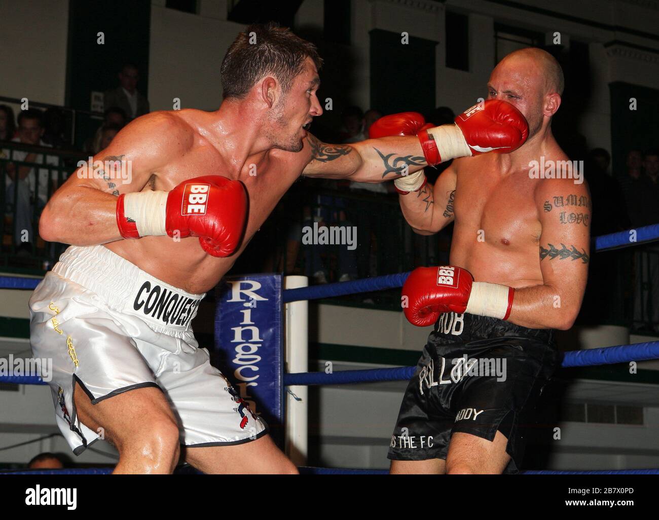 Tony Conquest (white shorts) defeats Bobby Scott in a Light-Heavyweight ...