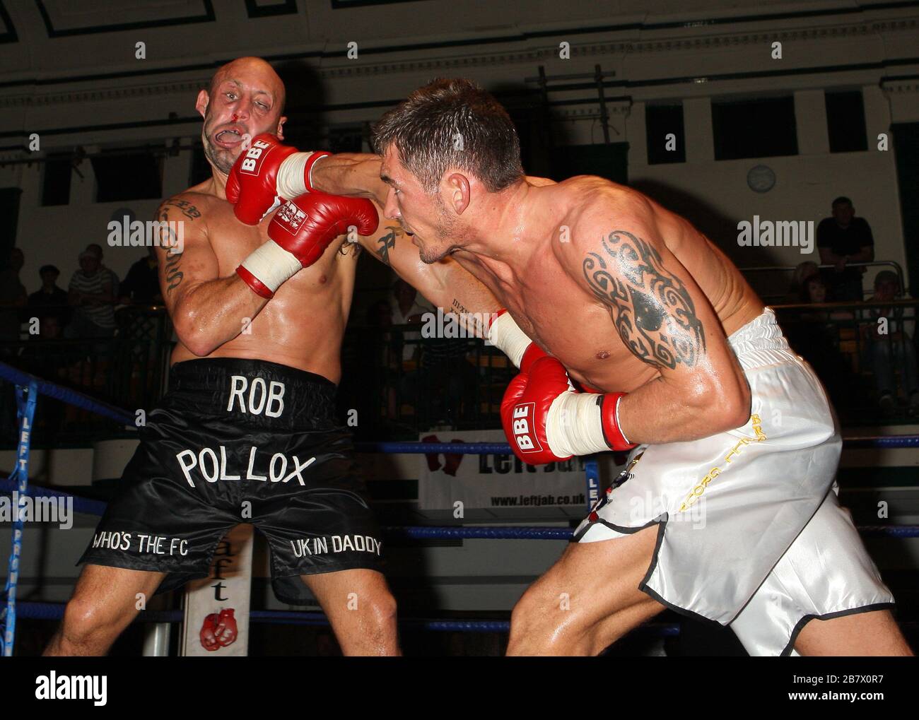 Tony Conquest (white shorts) defeats Bobby Scott in a Light-Heavyweight ...