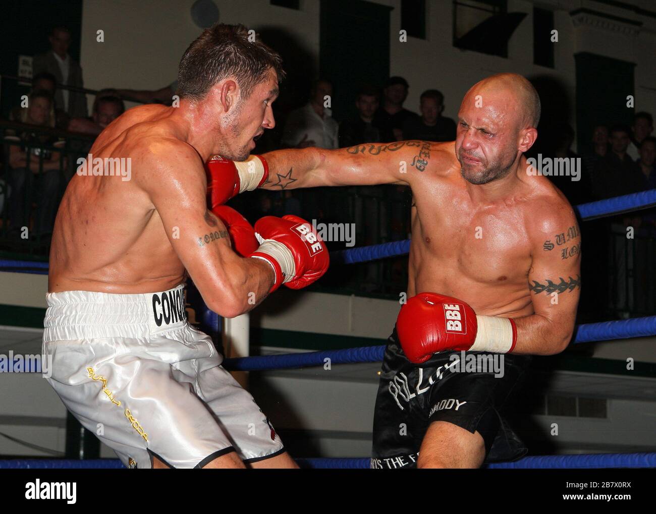 Tony Conquest (white shorts) defeats Bobby Scott in a Light-Heavyweight ...