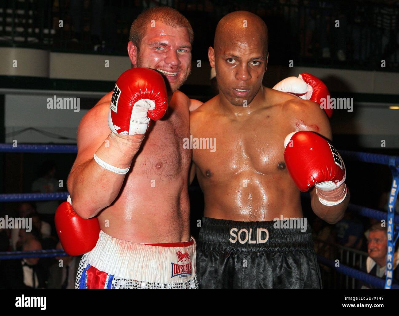 Leon Williams (black shorts) defeats Mark Lewis in a Cruiserweight ...