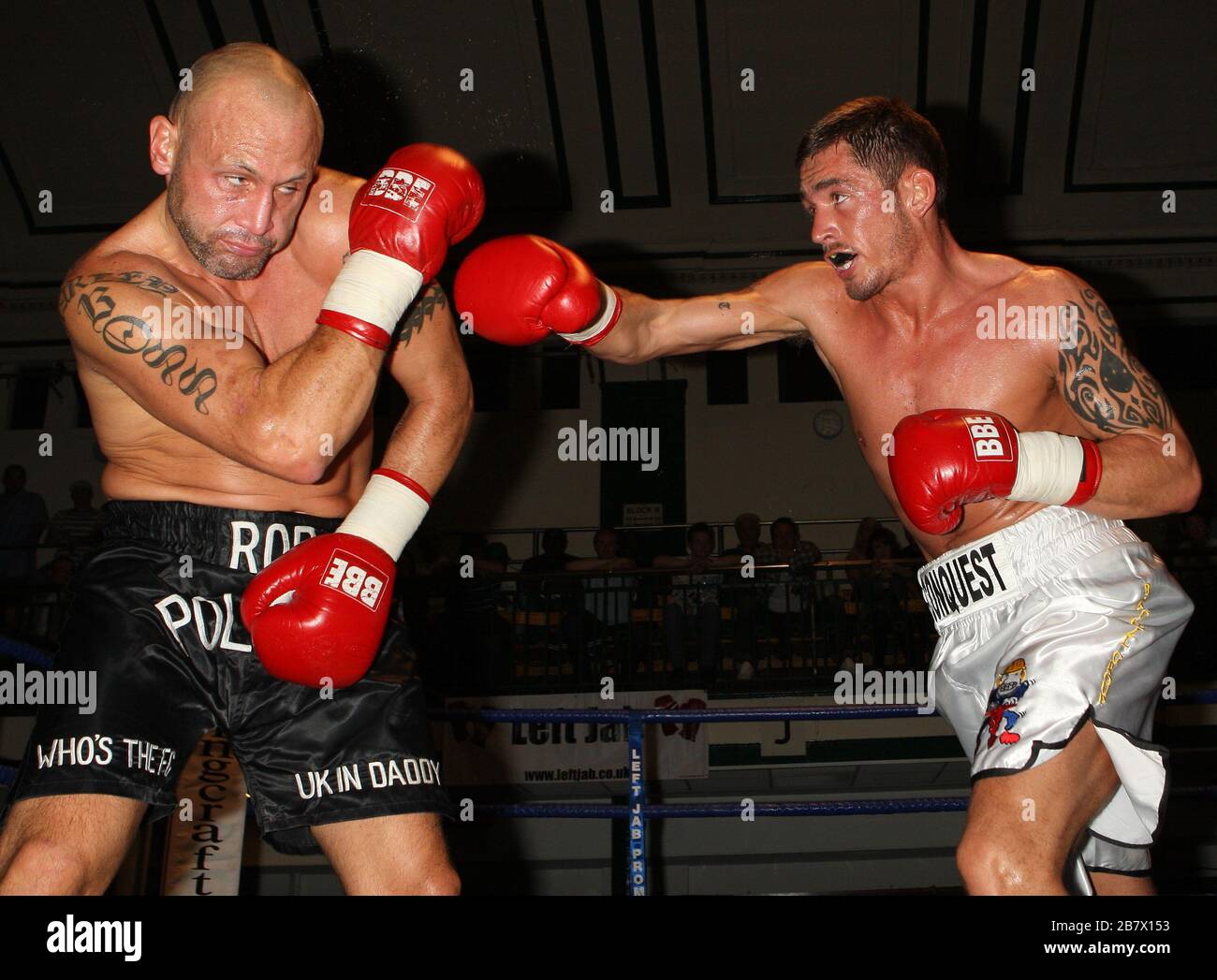 Tony Conquest (white shorts) defeats Bobby Scott in a Light-Heavyweight ...