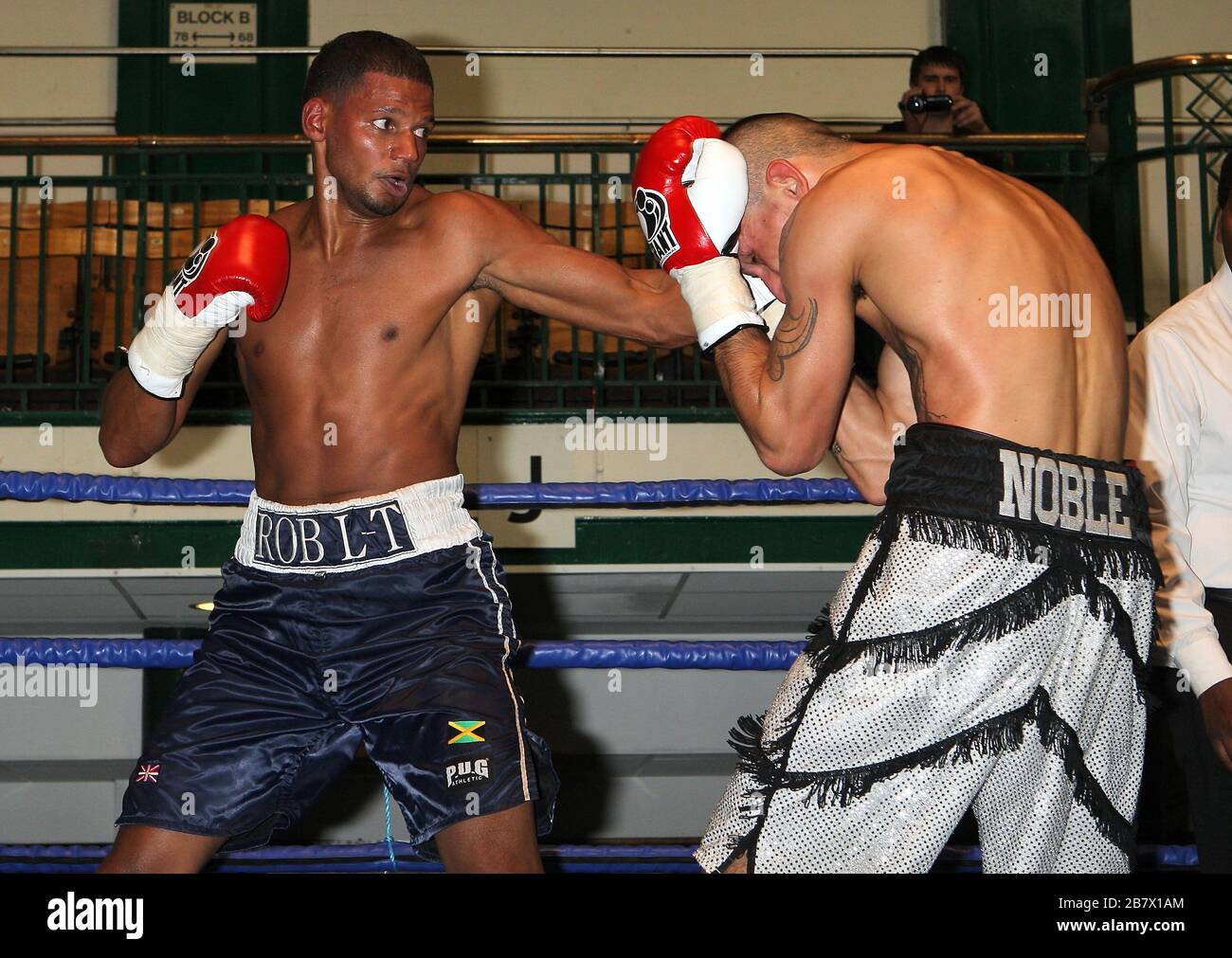 Robert Lloyd Taylor (dark blue shorts) defeats Lee Noble in a ...