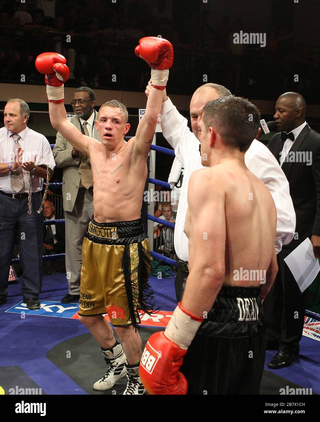 Jason Booth (Nottingham, gold shorts) defeats Rocky Dean (Thetford ...
