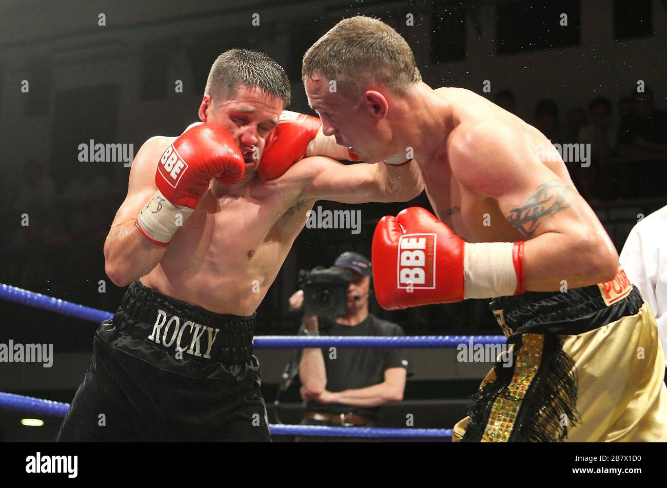 Jason Booth (Nottingham, gold shorts) defeats Rocky Dean (Thetford ...