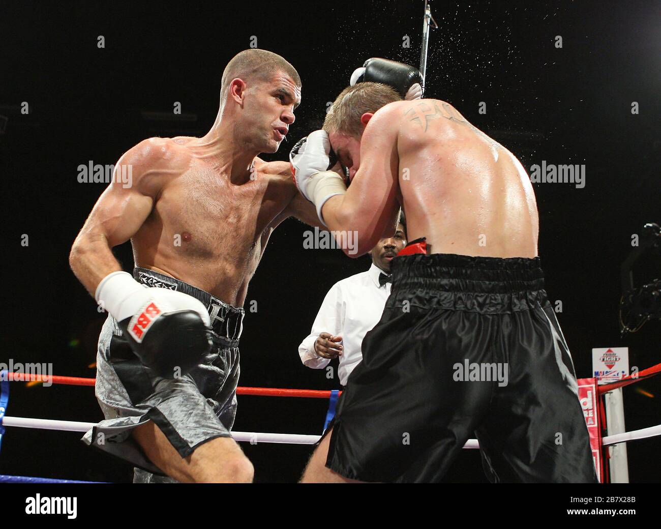Tony Hill (silver shorts) defeats Alex Spitko in a Middleweight boxing ...