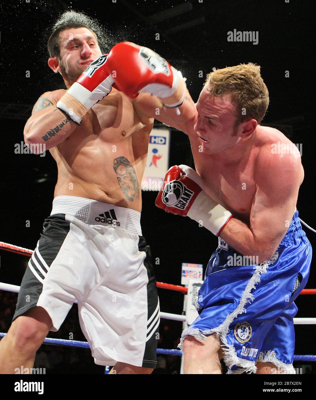 George Groves (blue shorts) defeats Grigor Sarohanian in a Super ...