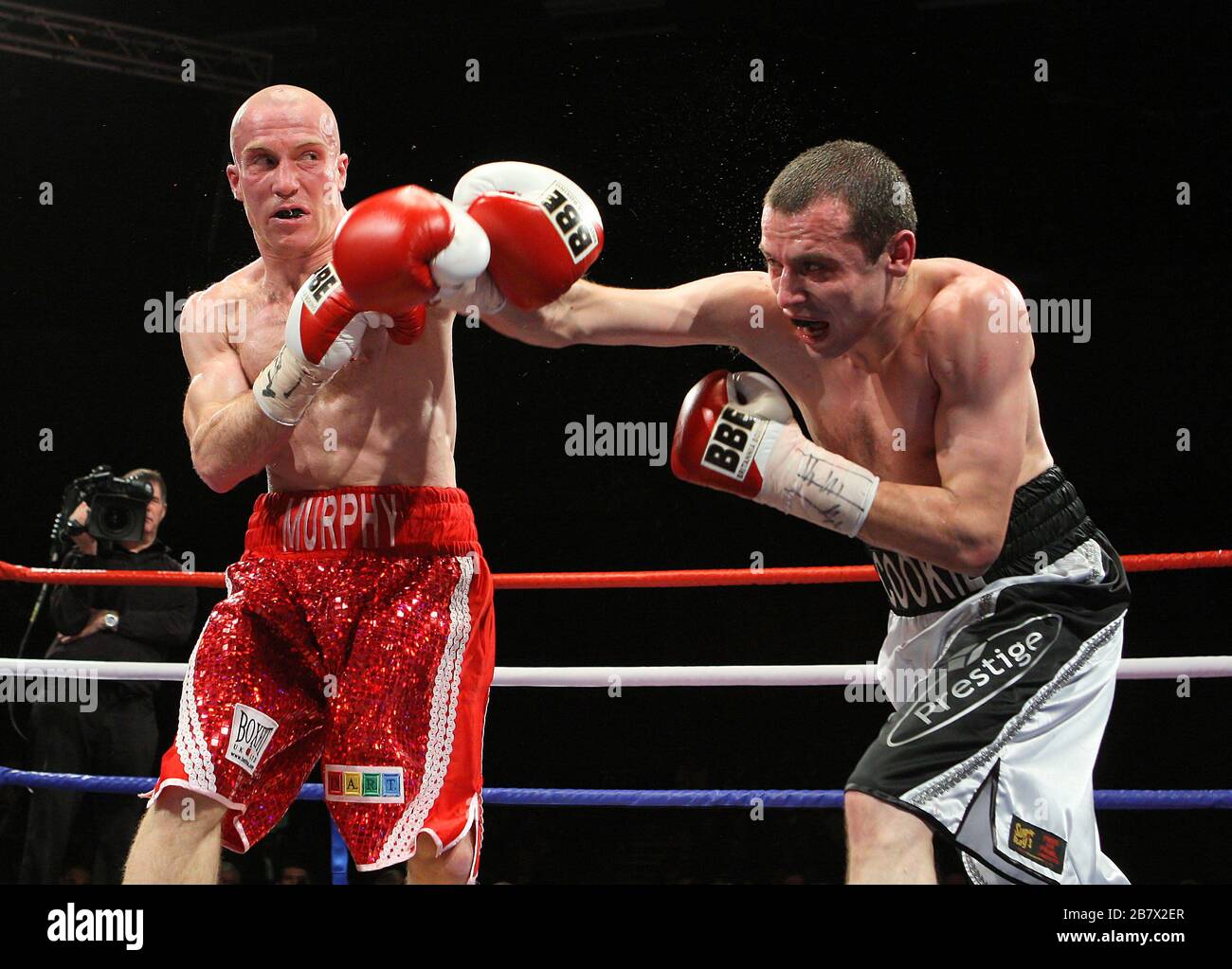 Ben Murphy (red shorts) defeats Lee Cook in a Lightweight boxing ...