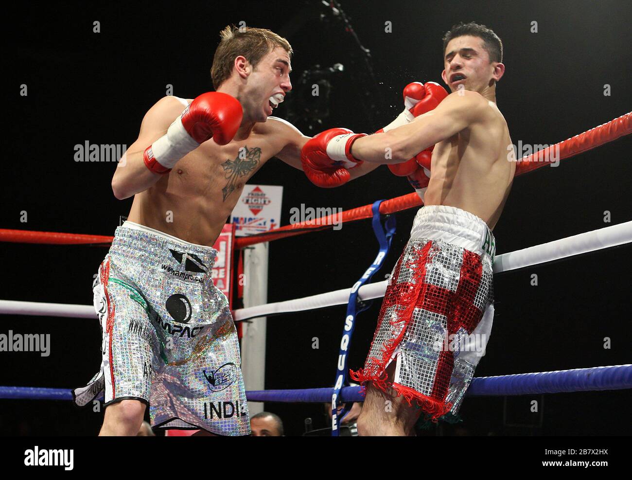 Ashley Sexton (silver shorts) defeats Usman Ahmed in a Flyweight boxing ...