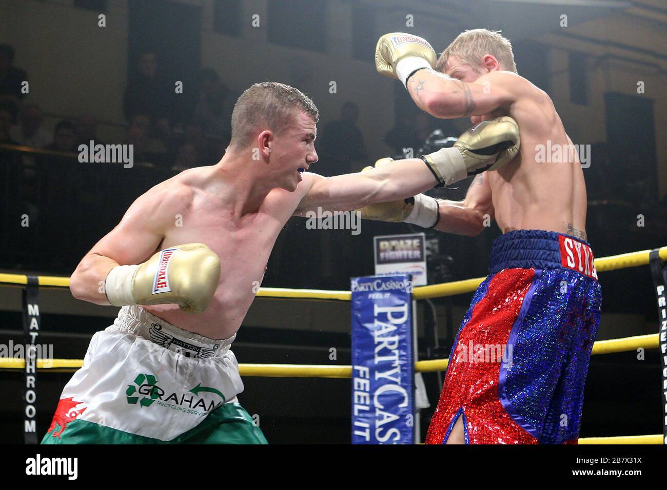 Gary Buckland (white green) defeats Gary Sykes (blue/red shorts) in the ...