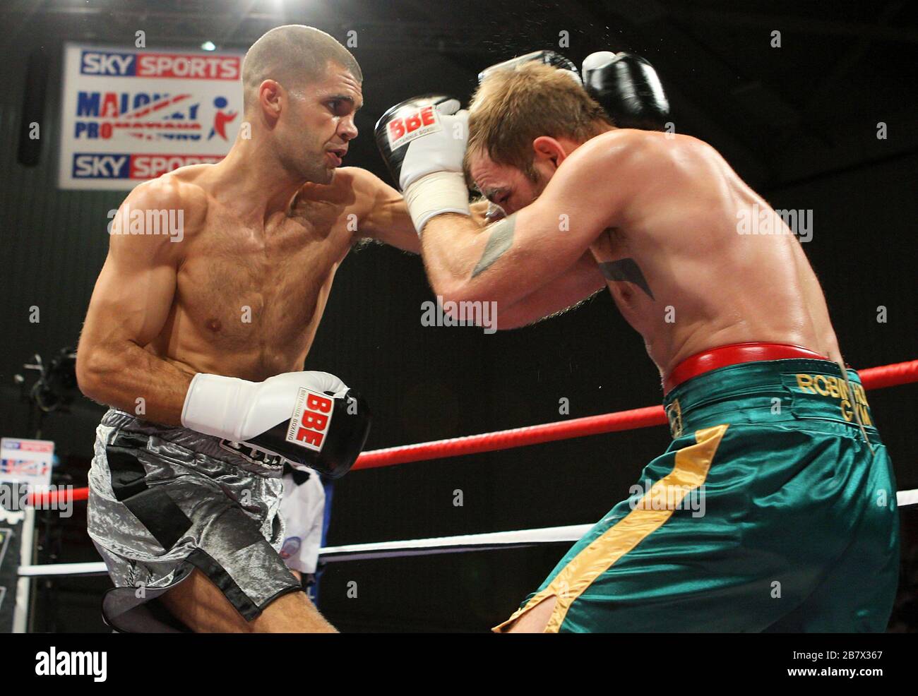 Tony Hill (silver shorts) defeats Matt Scriven in a Middleweight boxing ...