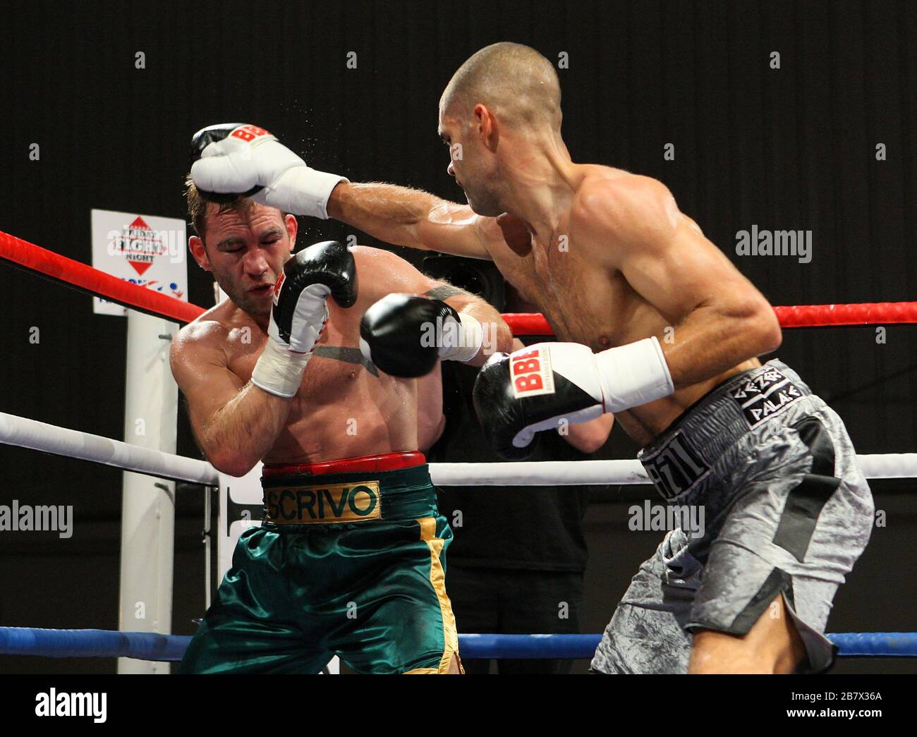 Tony Hill (silver shorts) defeats Matt Scriven in a Middleweight boxing ...