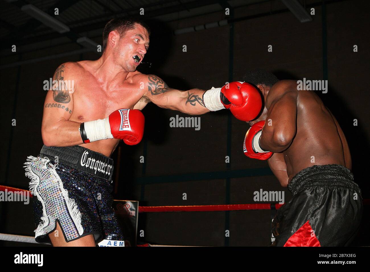 Tony Conquest (dark blue/silver shorts) defeats Prnce George Akrong in ...