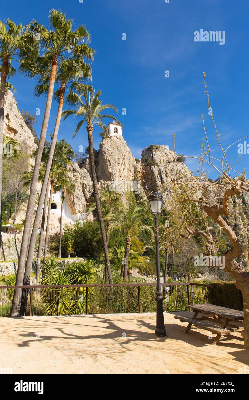 Guadalest Spain castle with palm trees in historic village near ...