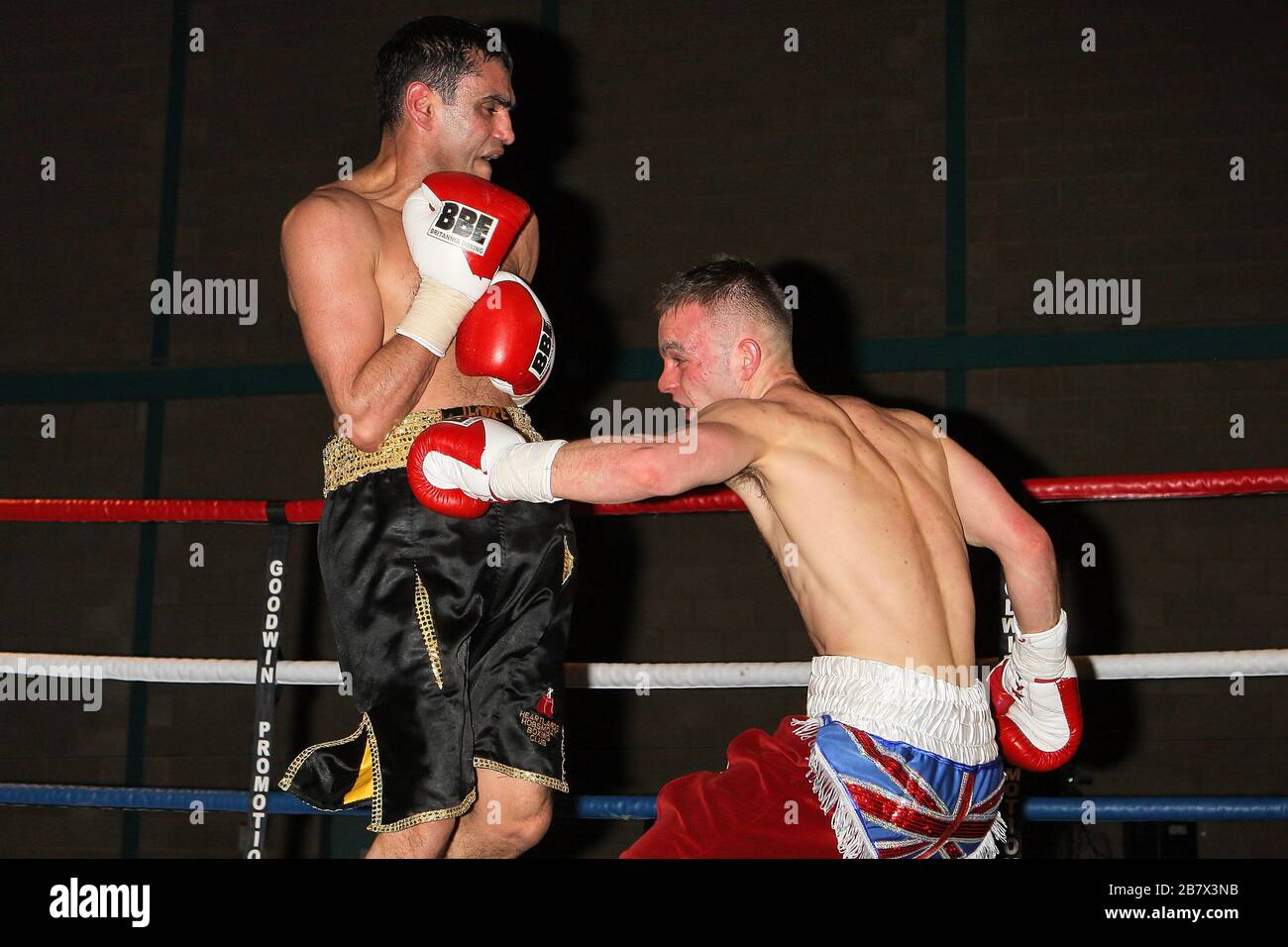 Michael Devine (claret shorts) defeats Sid Razak in a Lightweight ...