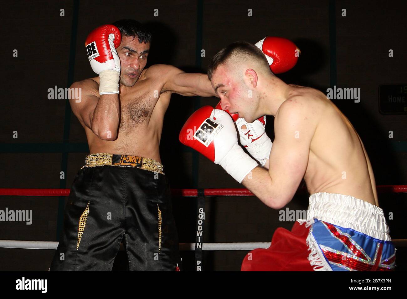 Michael Devine (claret shorts) defeats Sid Razak in a Lightweight ...