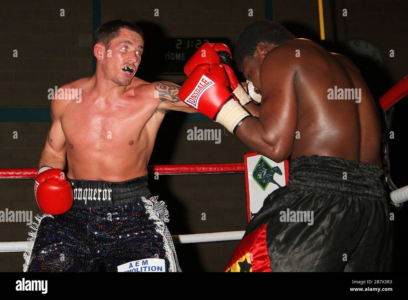 Tony Conquest (dark blue/silver shorts) defeats Prnce George Akrong in ...