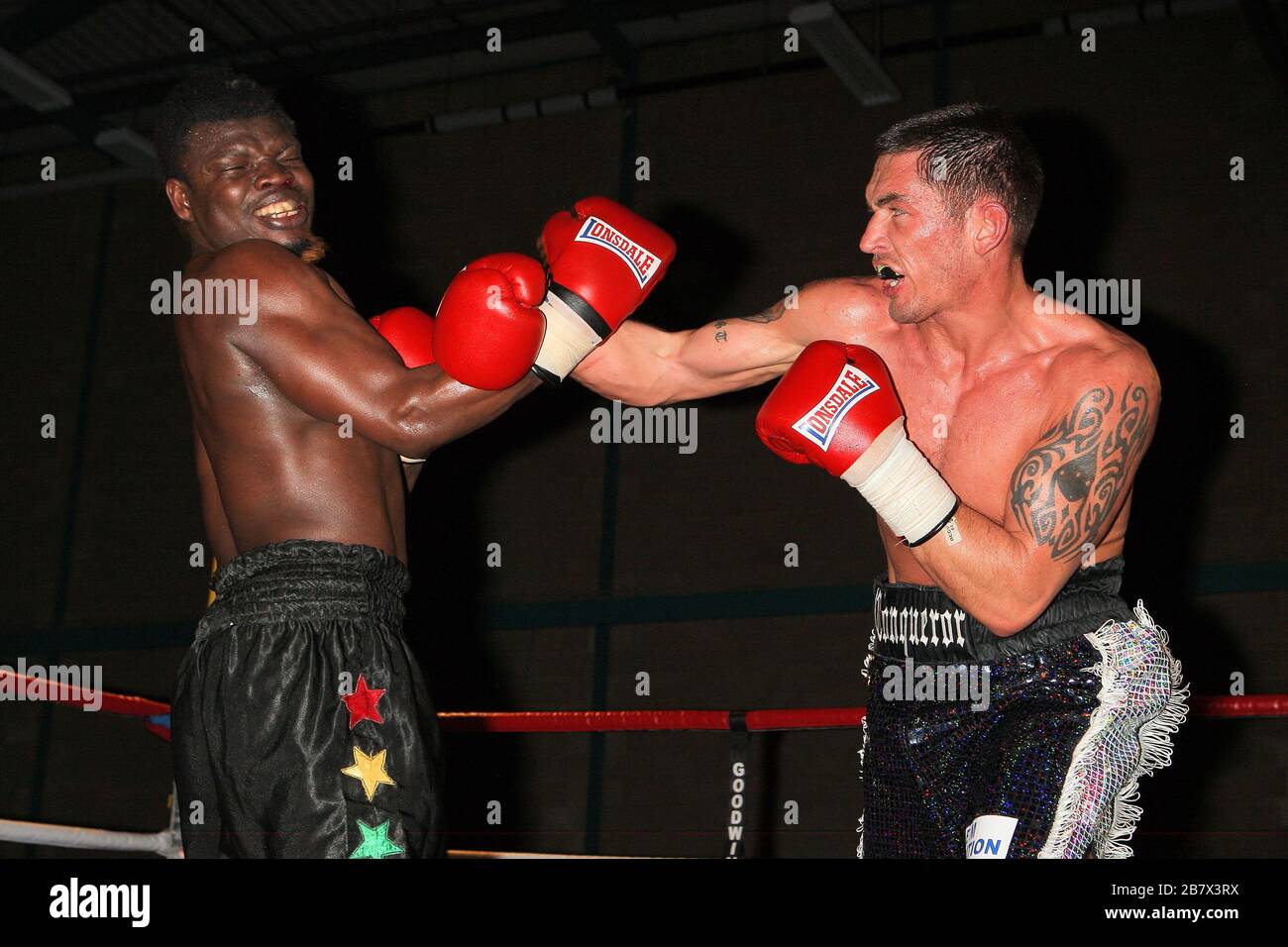 Tony Conquest (dark blue/silver shorts) defeats Prnce George Akrong in ...