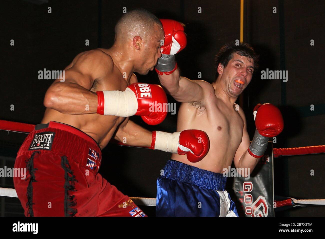 Michael Norgrove (red shorts) defeats Jan Balog in a LightMiddleweight ...