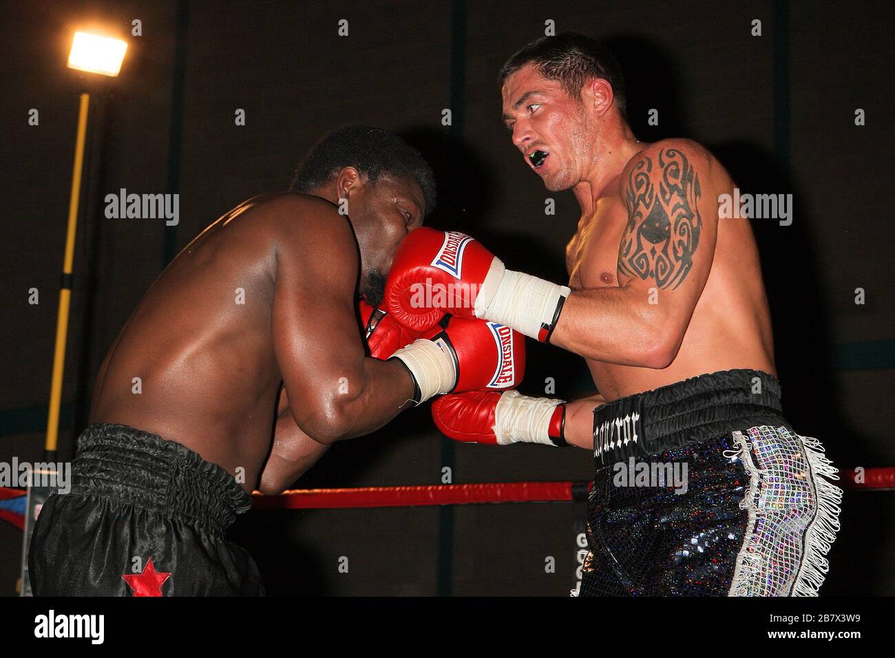 Tony Conquest (dark blue/silver shorts) defeats Prnce George Akrong in ...