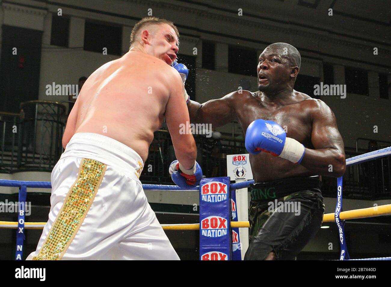 Tom Little (white shorts) defeats Hastings Rasani in a Heavyweight ...