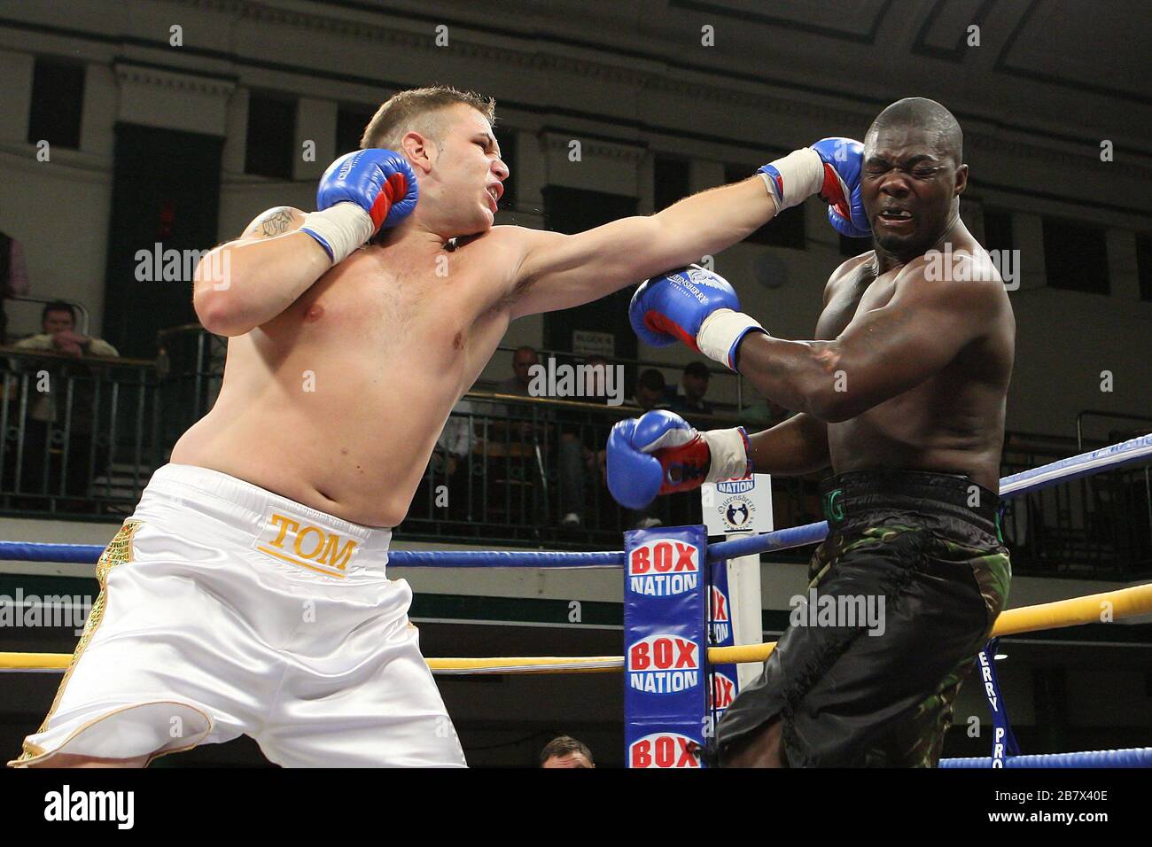 Tom Little (white shorts) defeats Hastings Rasani in a Heavyweight ...