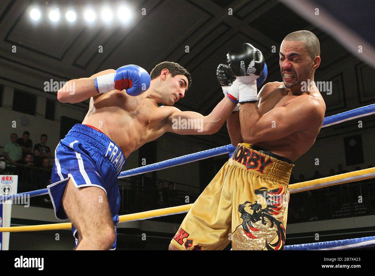 Frank Buglioni (blue shorts) defeats Paul Morby in a Super-Middleweight ...