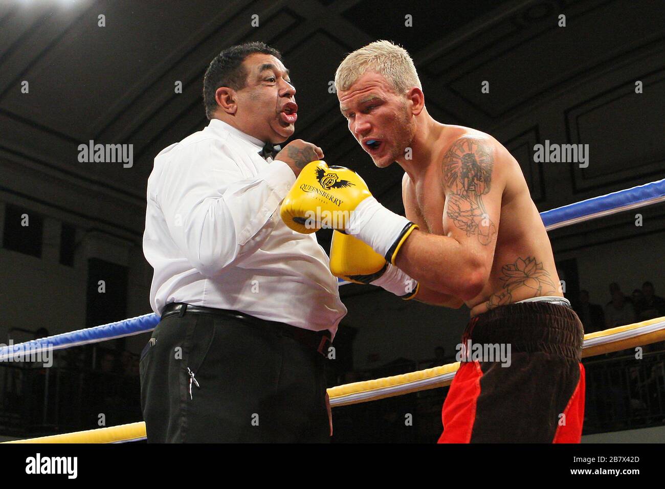 Matty Tew (red/blue shorts) defeats Robin Deakin in a Light ...