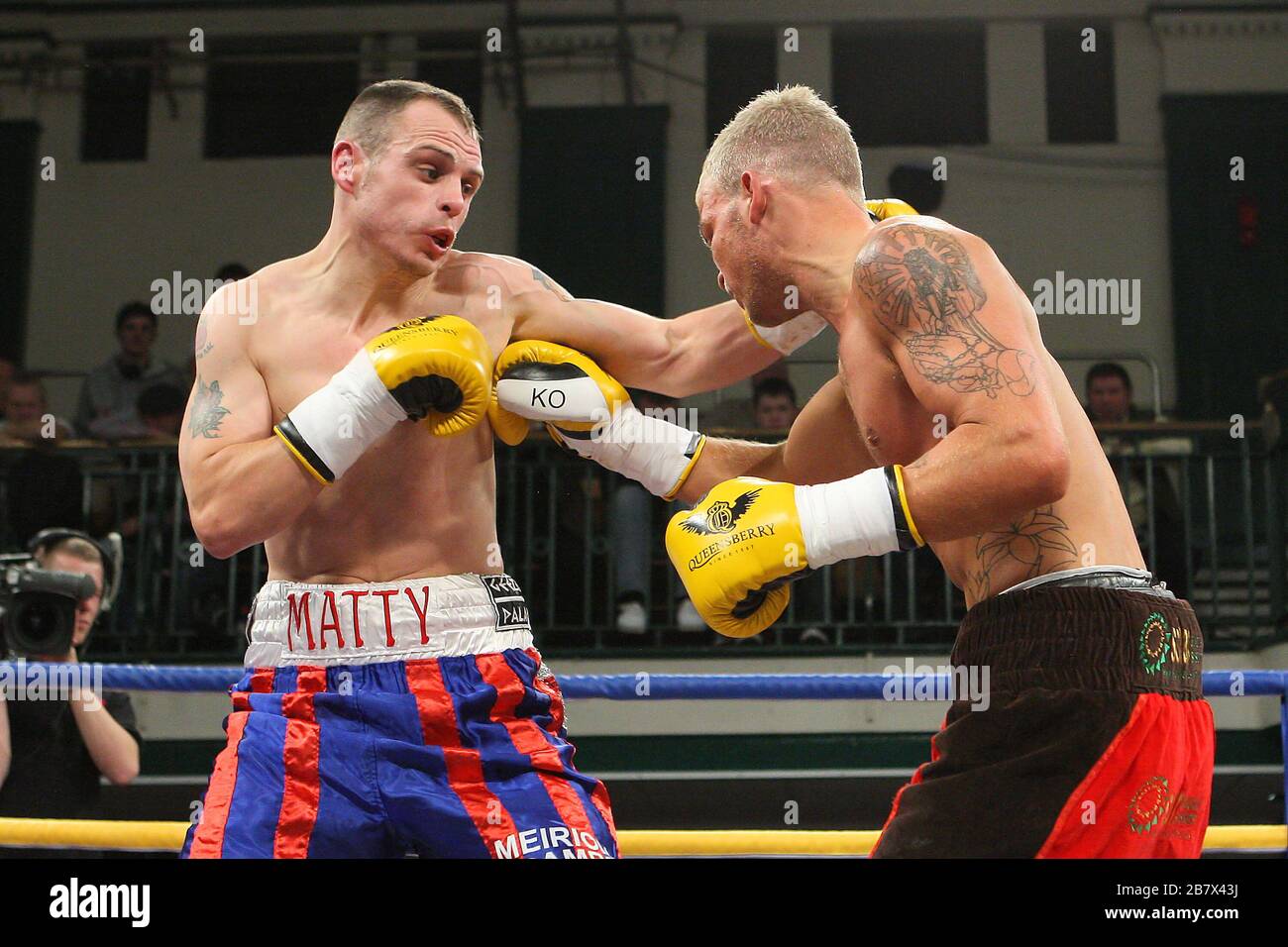 Matty Tew (red/blue shorts) defeats Robin Deakin in a Light ...