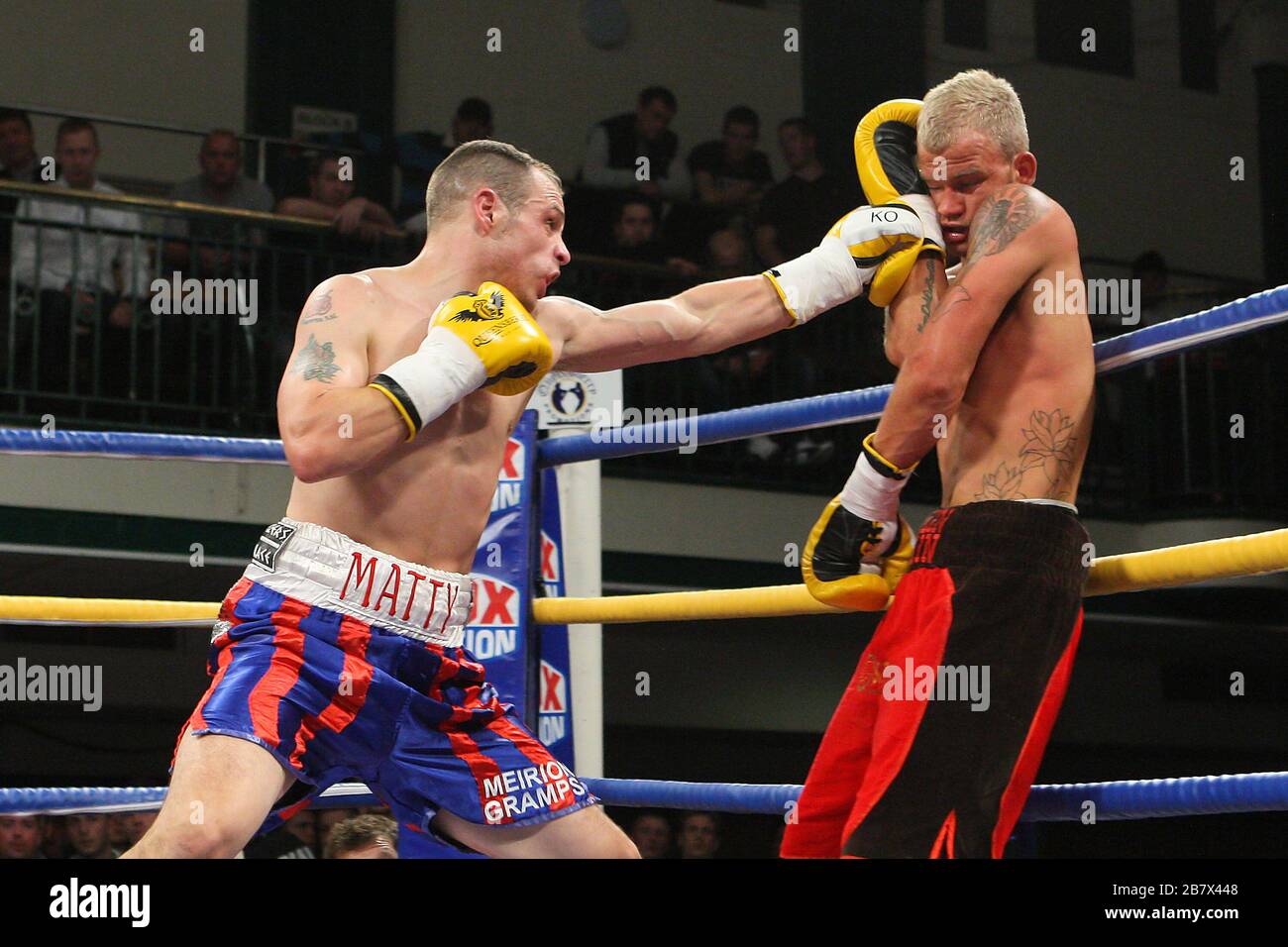 Matty Tew (red/blue shorts) defeats Robin Deakin in a Light ...