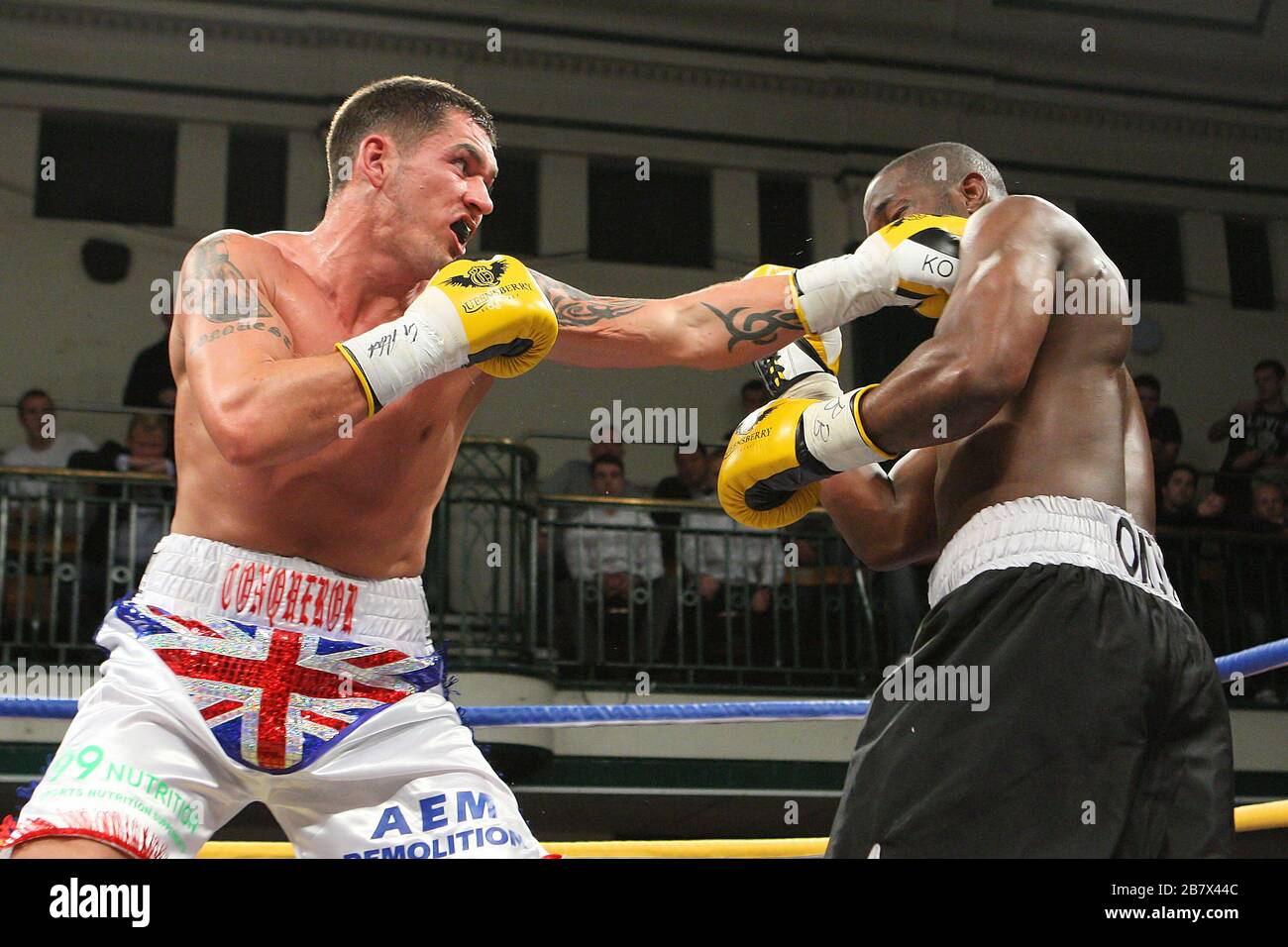 Tony Conquest (white shorts) defeats Toks Owoh in a Cruiserweight ...