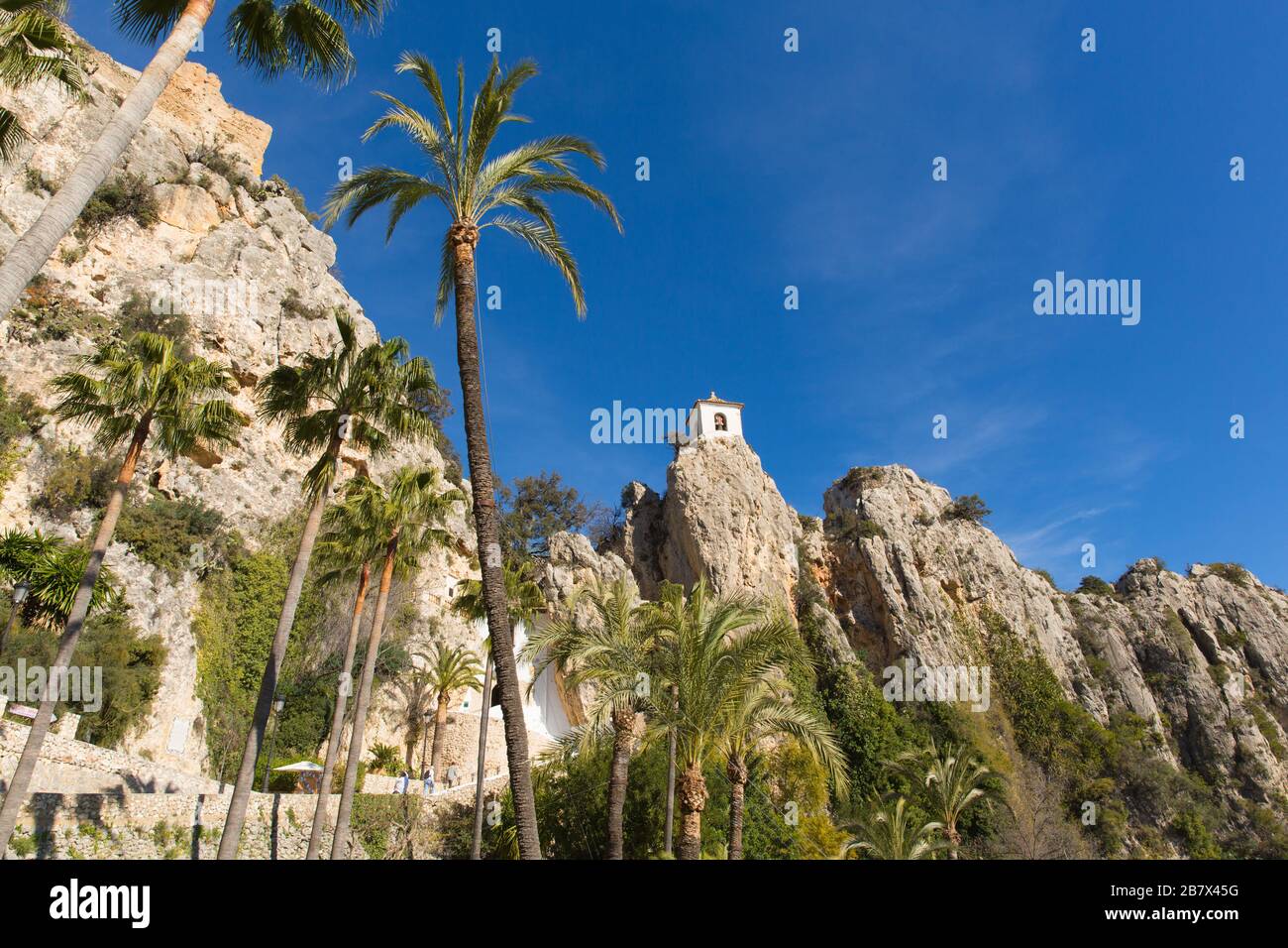 Guadalest Spain castle with palm trees in historic village near ...