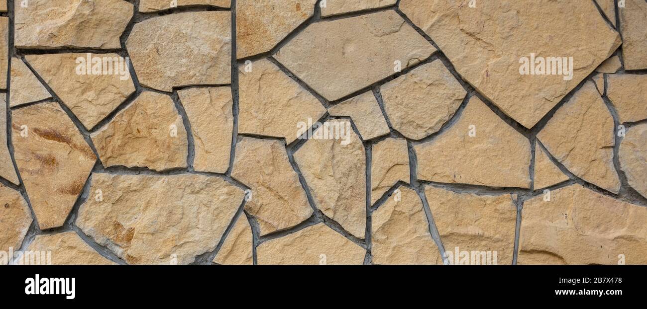 Decorative wall texture Rocks background. Wall of many stones with ...